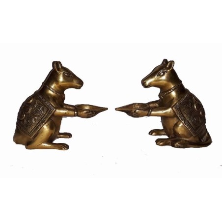 Mushika (Mouse) holding Deepa